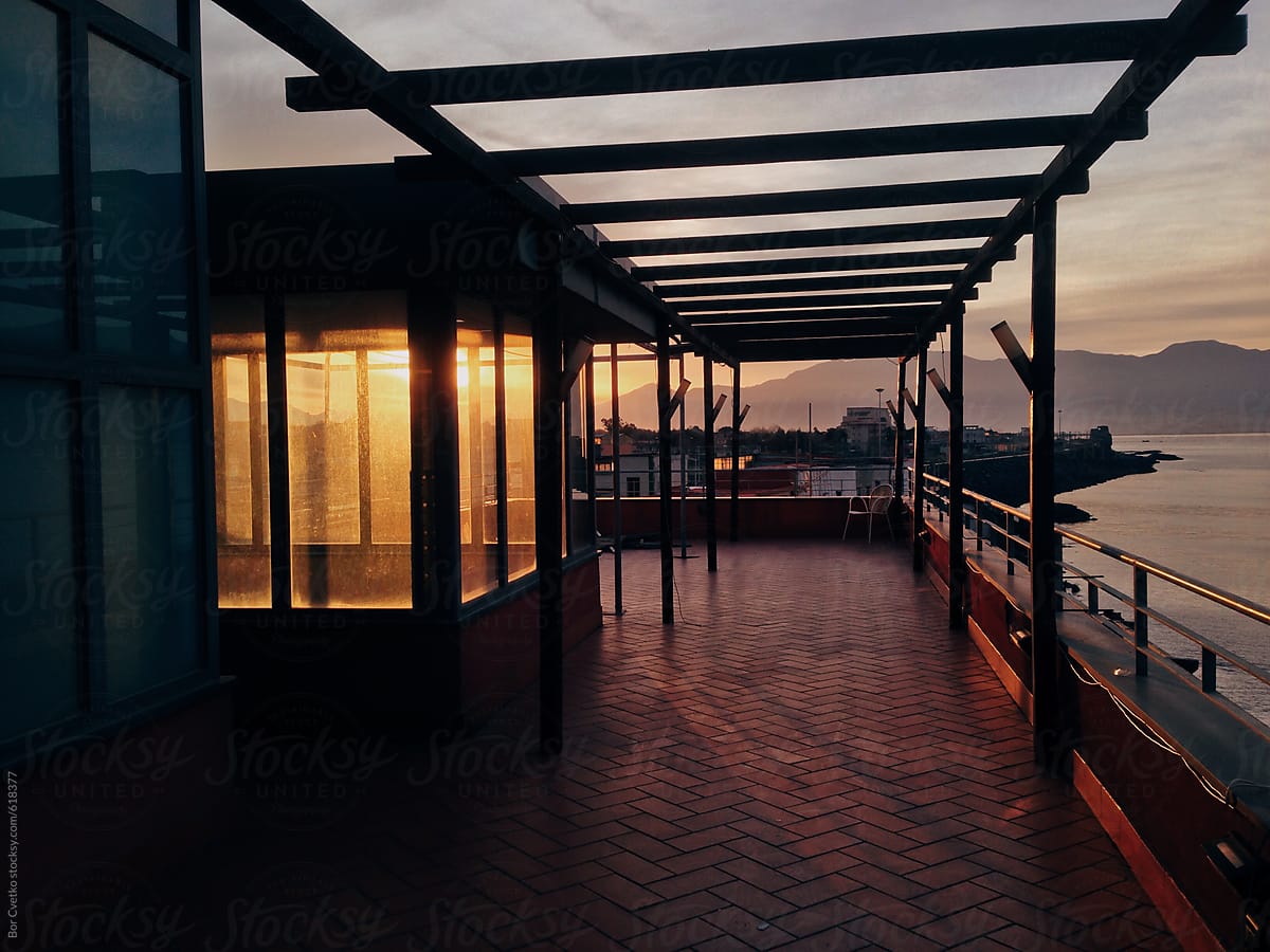 "Sunrise Through Windows" by Stocksy Contributor "Bor Cvetko" - Stocksy