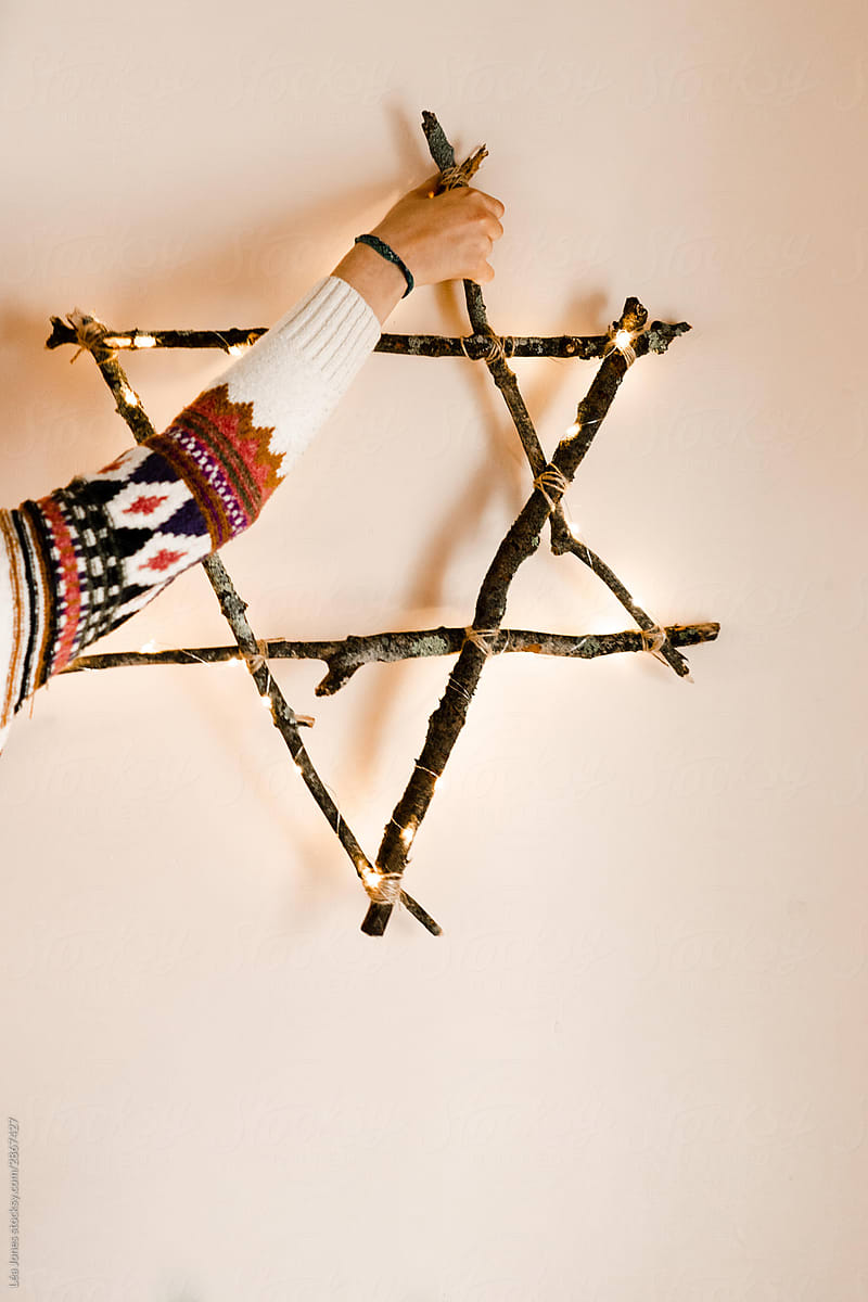 "Homemade Star On Wall" by Stocksy Contributor "Lea Jones" - Stocksy