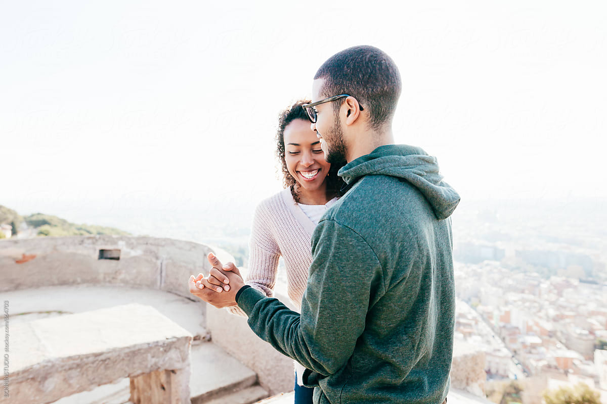"Mixed Race Couple Dancing Together Above City." by Stocksy Contributor ...