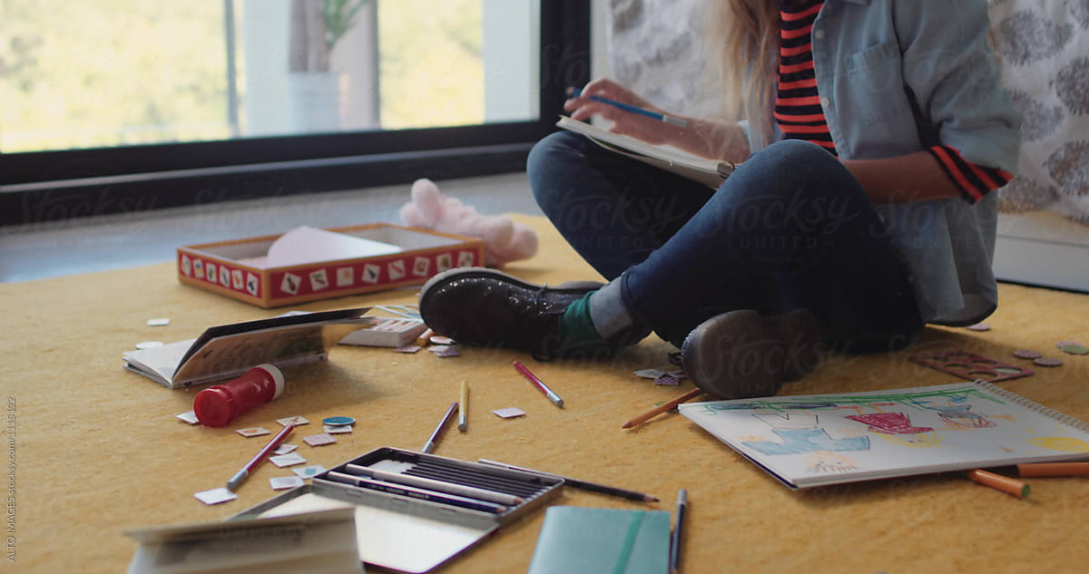 "Girl Drawing While Sitting On Floor" by Stocksy Contributor "ALTO ...