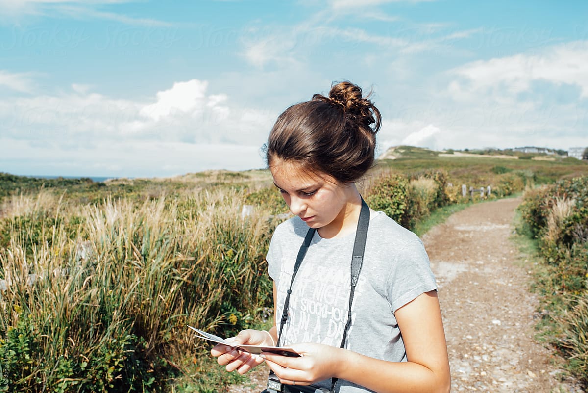 "Young Woman Looking At Photos She Just Took" by Stocksy Contributor ...