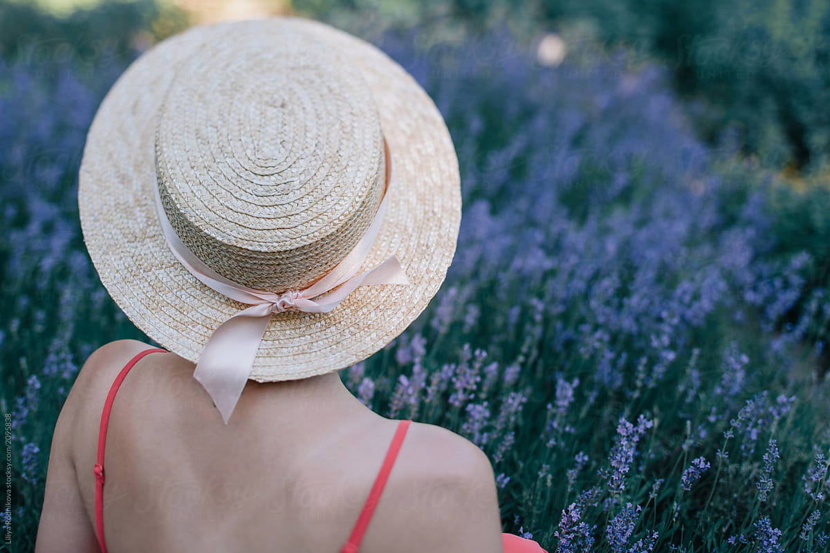 "Anonymous Woman In Straw Hat By The Lavender" by Stocksy Contributor ...