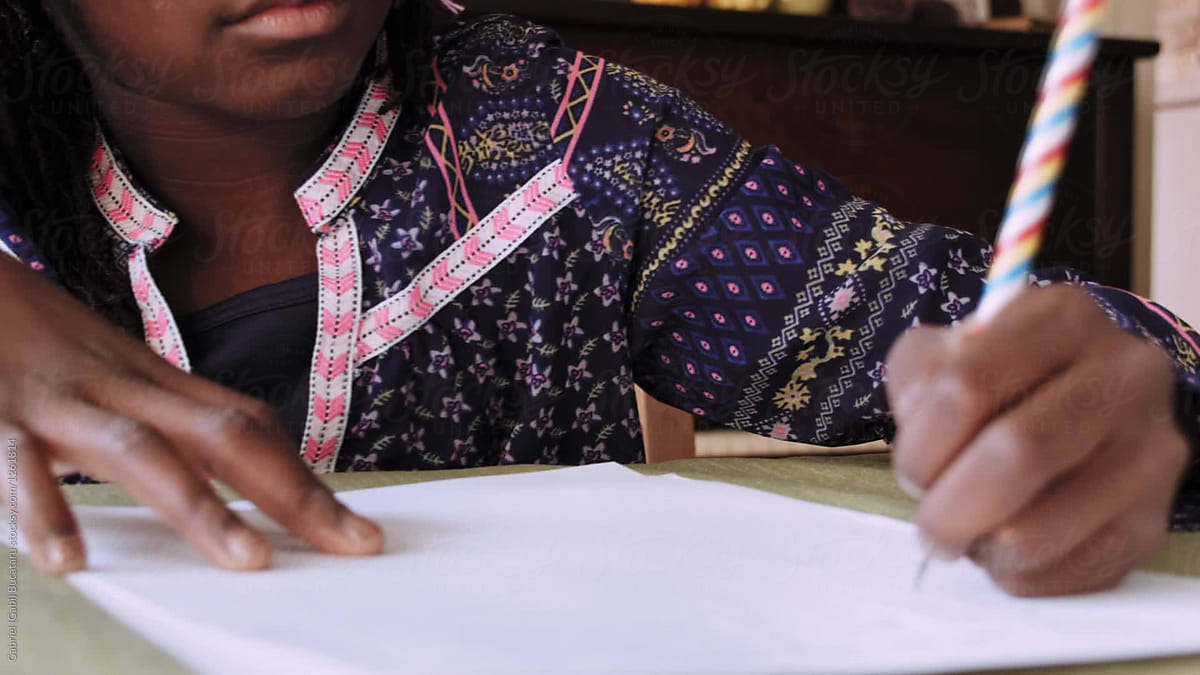 "Black Girl's Hand Writing On A Paper" by Stocksy Contributor "Gabi ...