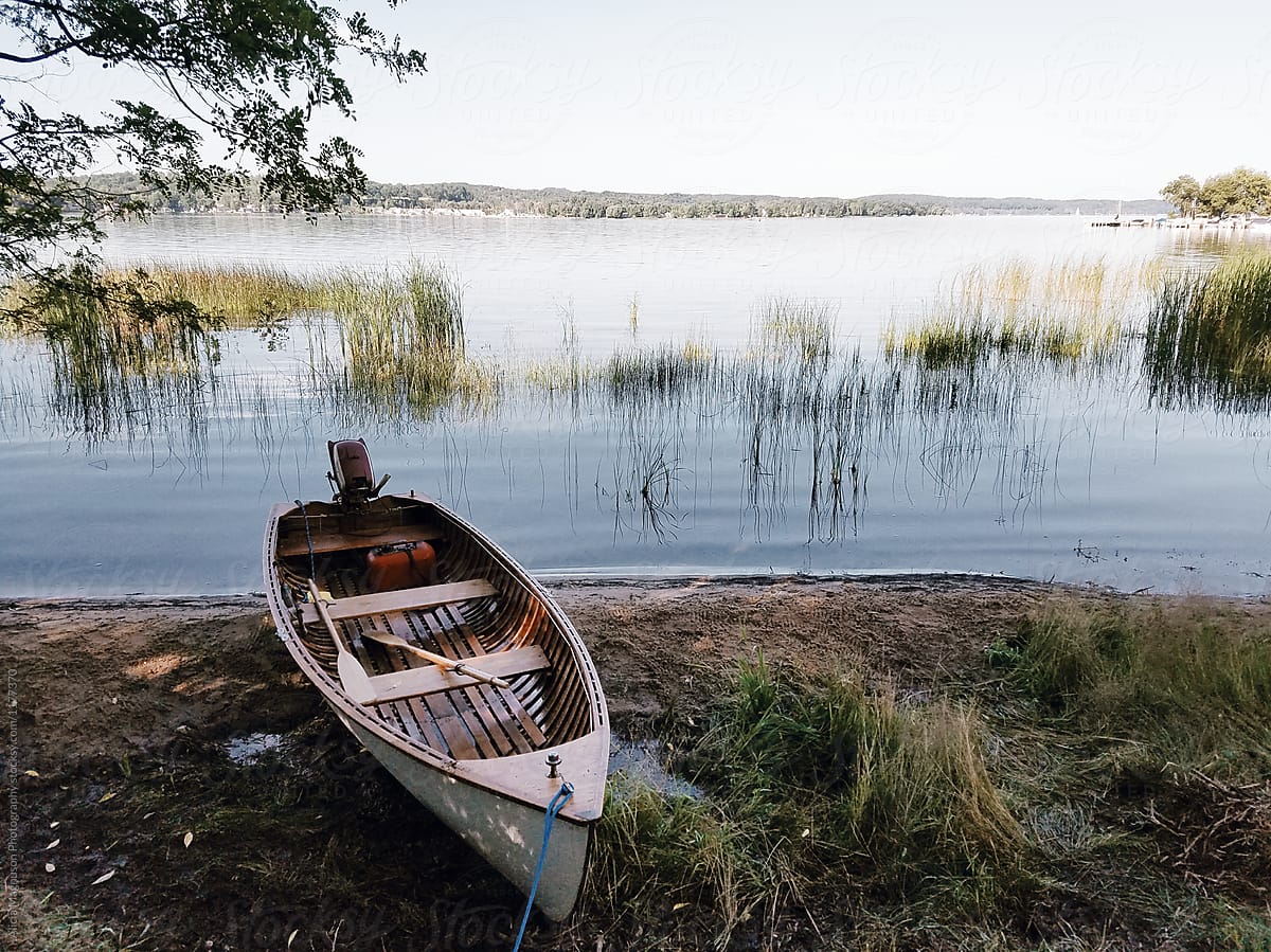 "Wooden Boat On Shore" by Stocksy Contributor "Alicia Magnuson ...