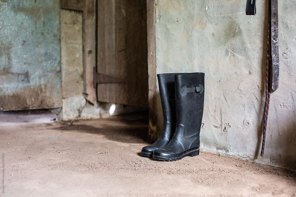 "Wet Weather Boots On A Dirt Floor" by Stocksy Contributor "Jacqui ...