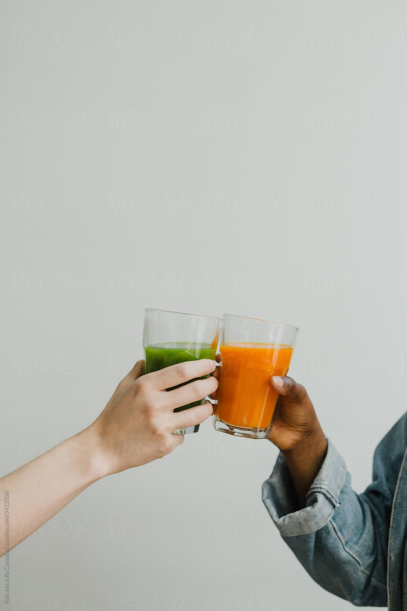 "Friends Drinking Cold Pressed Juice Together - Cheers!" by Stocksy ...