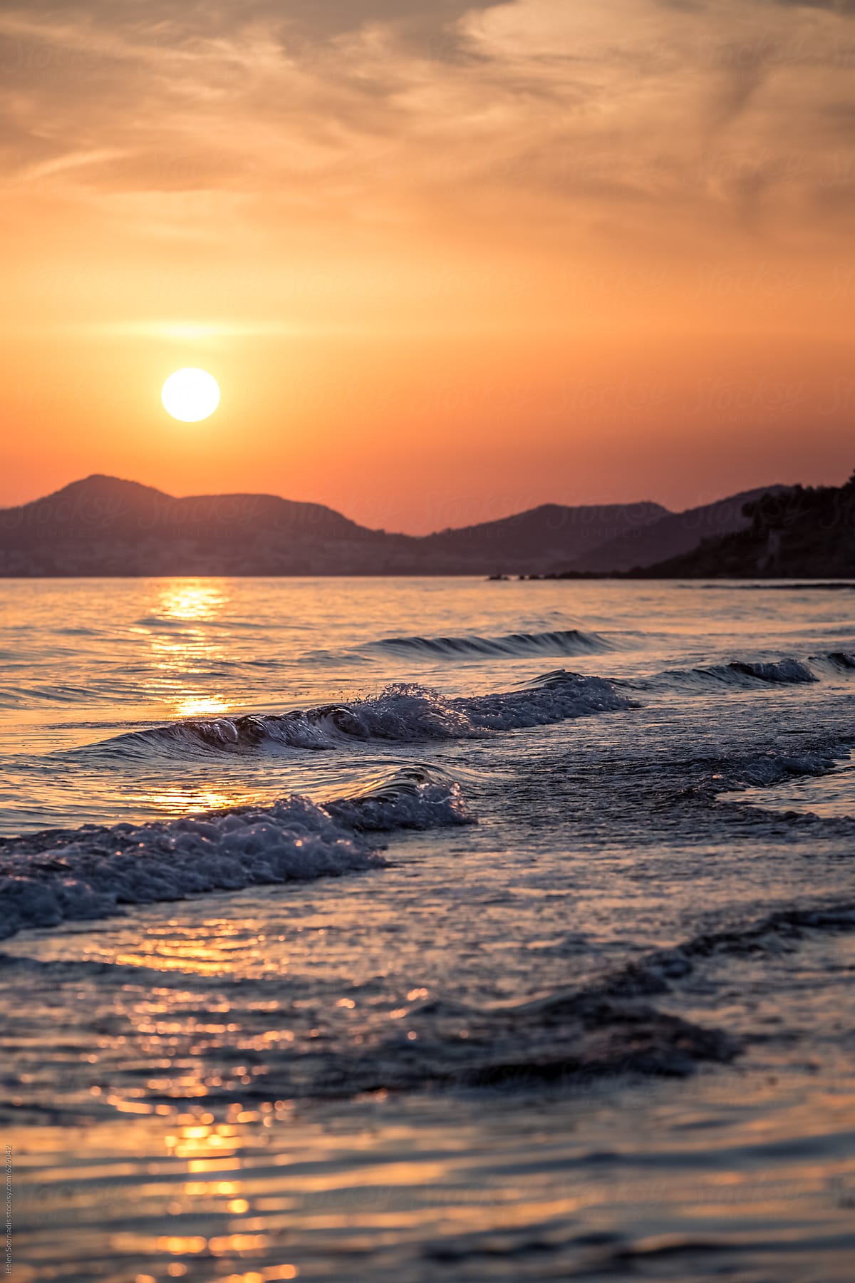 "Seascape At Sunset With Waves" by Stocksy Contributor "Helen ...