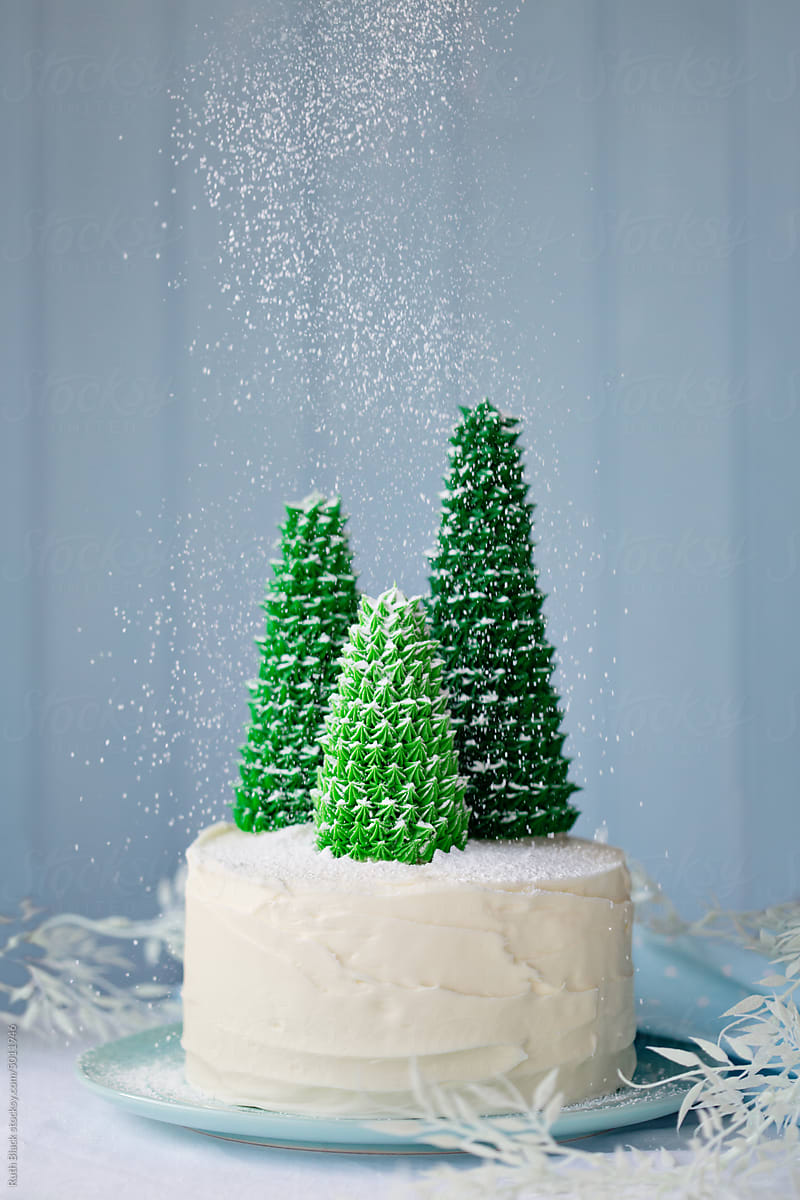 "Christmas Cake With Buttercream Christmas Trees" by Stocksy ...
