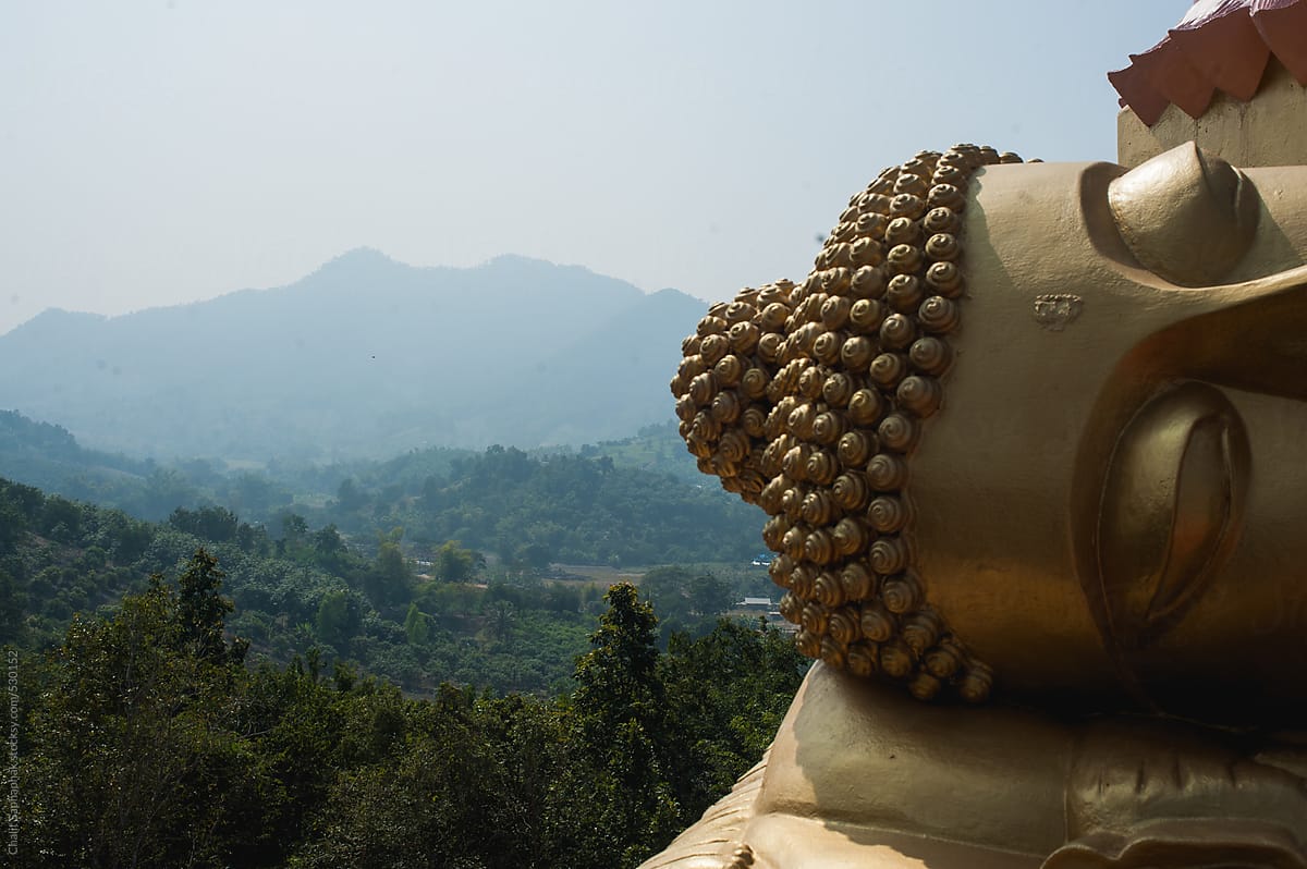 "Buddha Statue" by Stocksy Contributor "Chalit Saphaphak" - Stocksy