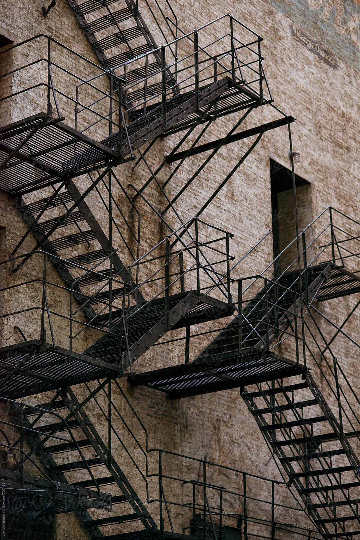 "Fire Escapes" by Stocksy Contributor "Javier Márquez " - Stocksy