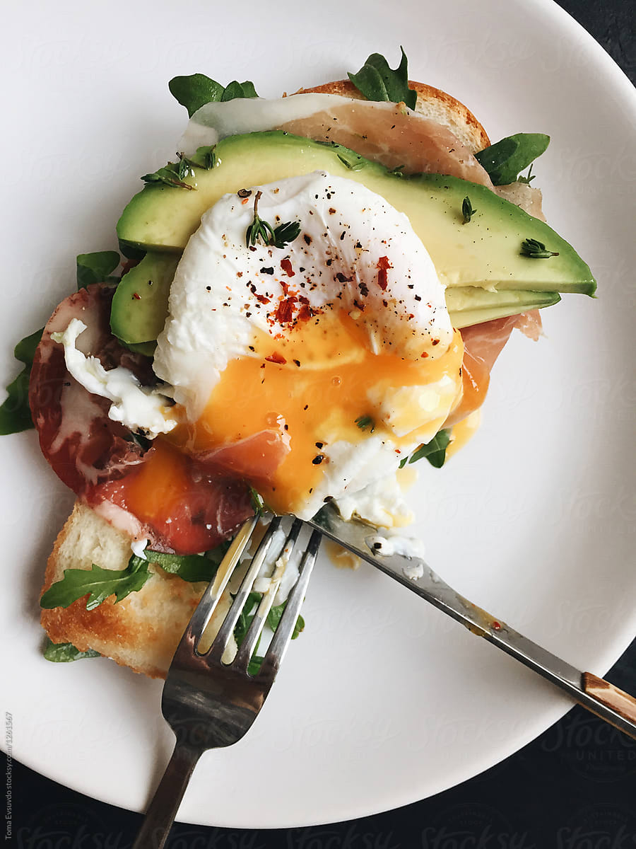 "Benedict Egg On Toast For Breakfast" by Stocksy Contributor "Toma ...