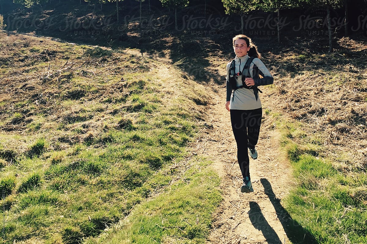 "Active Woman Running On A Hill" by Stocksy Contributor "Sky-Blue ...