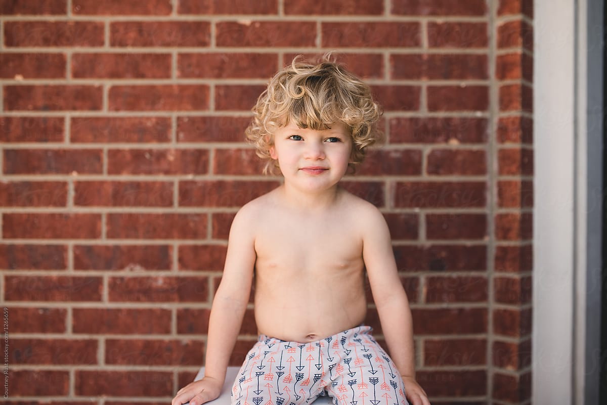"Portrait Of A Boy" by Stocksy Contributor "Courtney Rust" - Stocksy