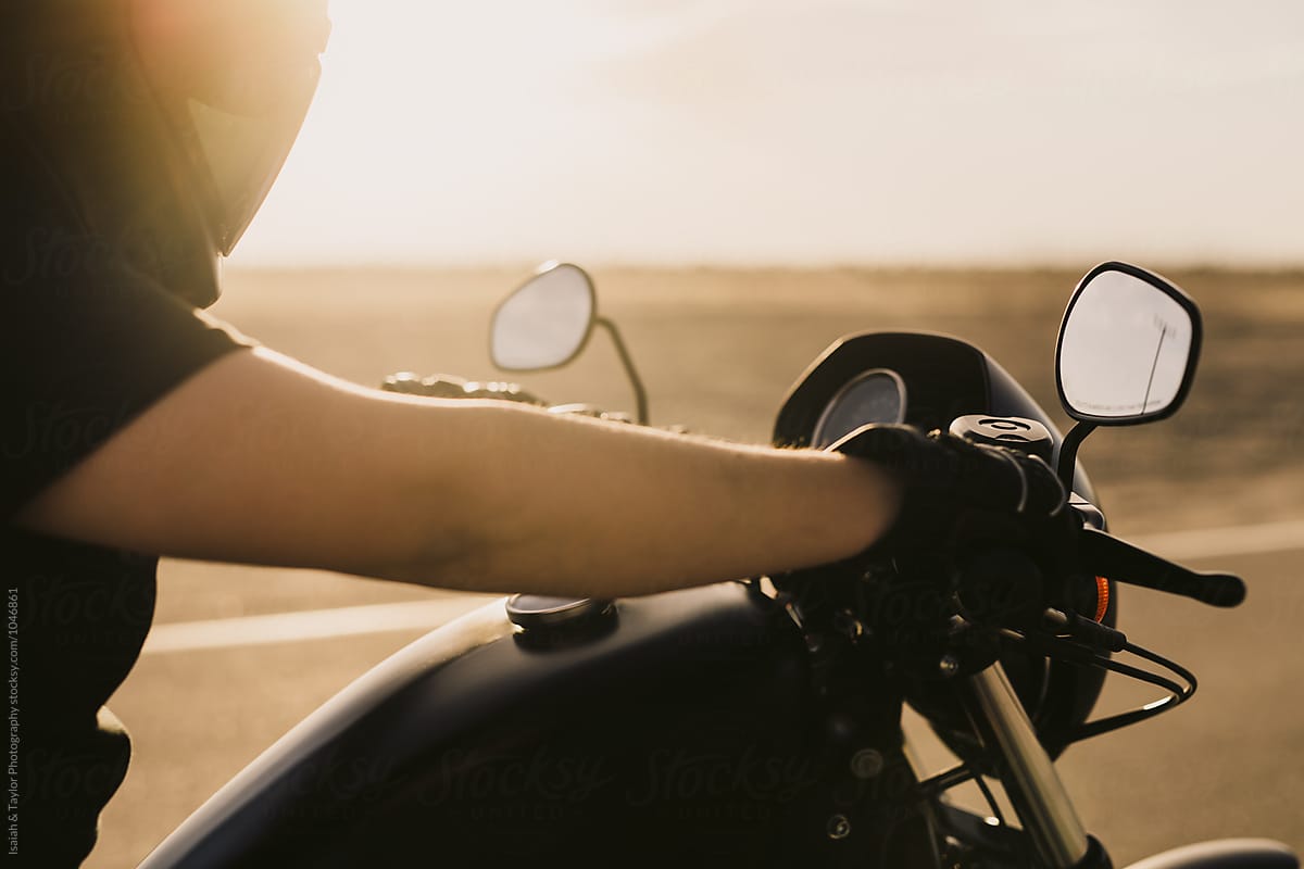 "Hands On Motorcycle" by Stocksy Contributor "Itla" - Stocksy