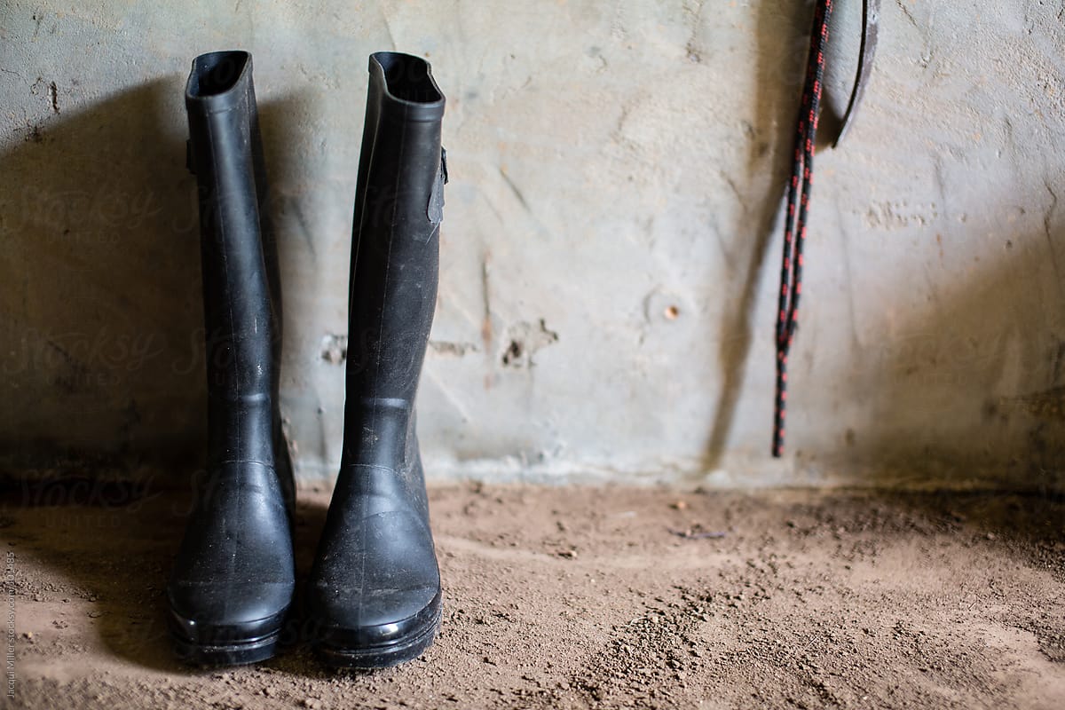 "Wet Weather Boots On A Dirt Floor" by Stocksy Contributor "Jacqui ...