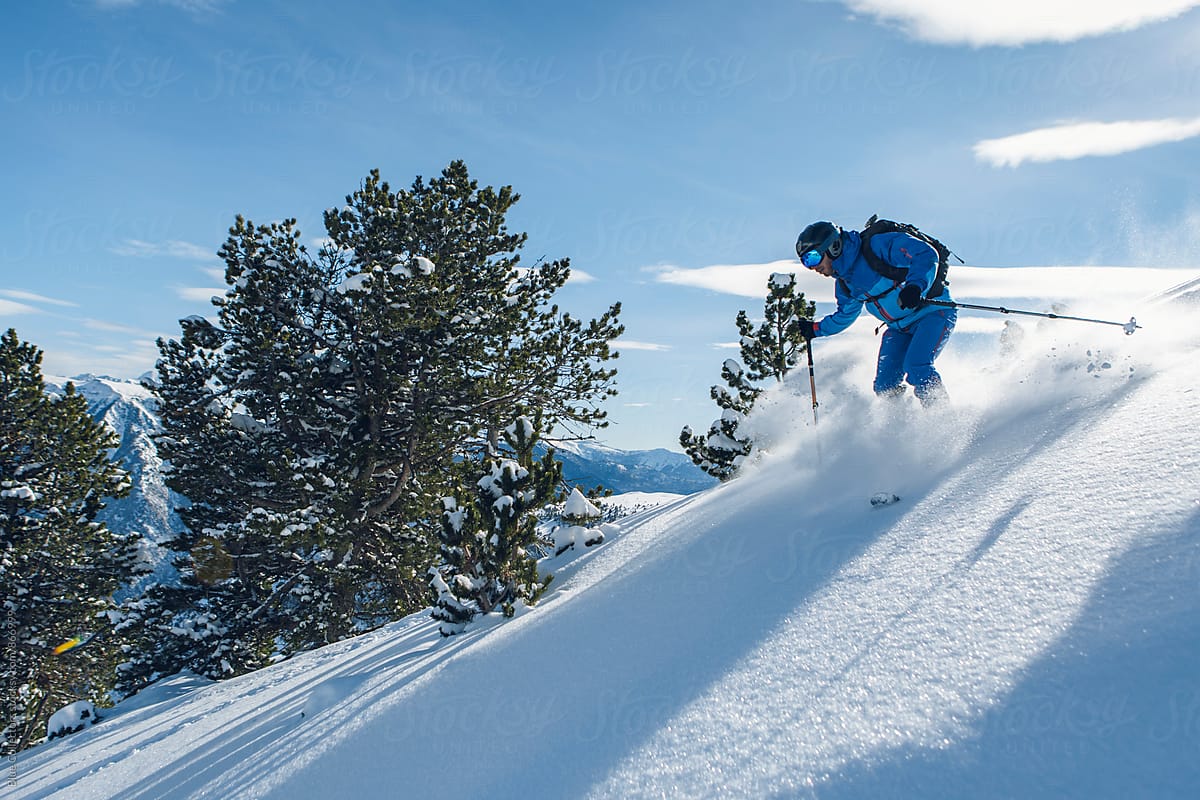 "Skier Man Down The Powder Mountain In A Sunny Day" by Stocksy ...