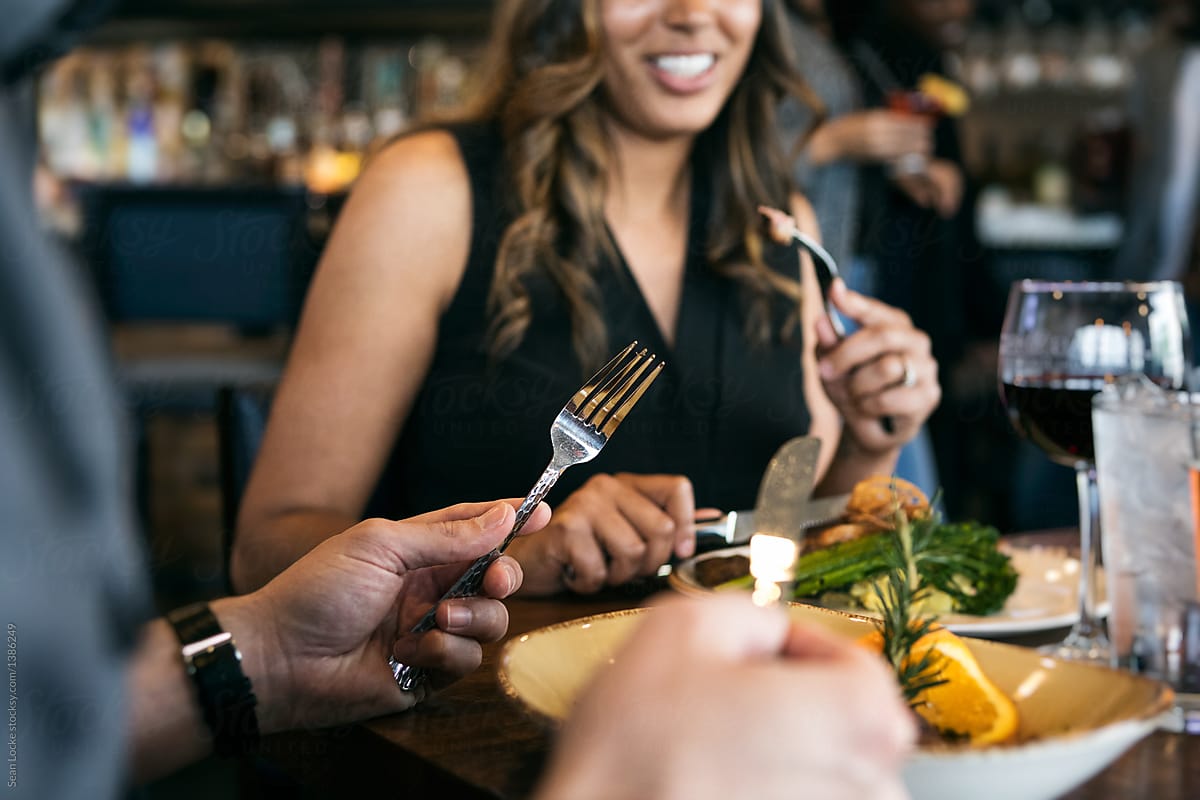 "Restaurant: Focus On Man's Fork During Dinner" by Stocksy Contributor ...