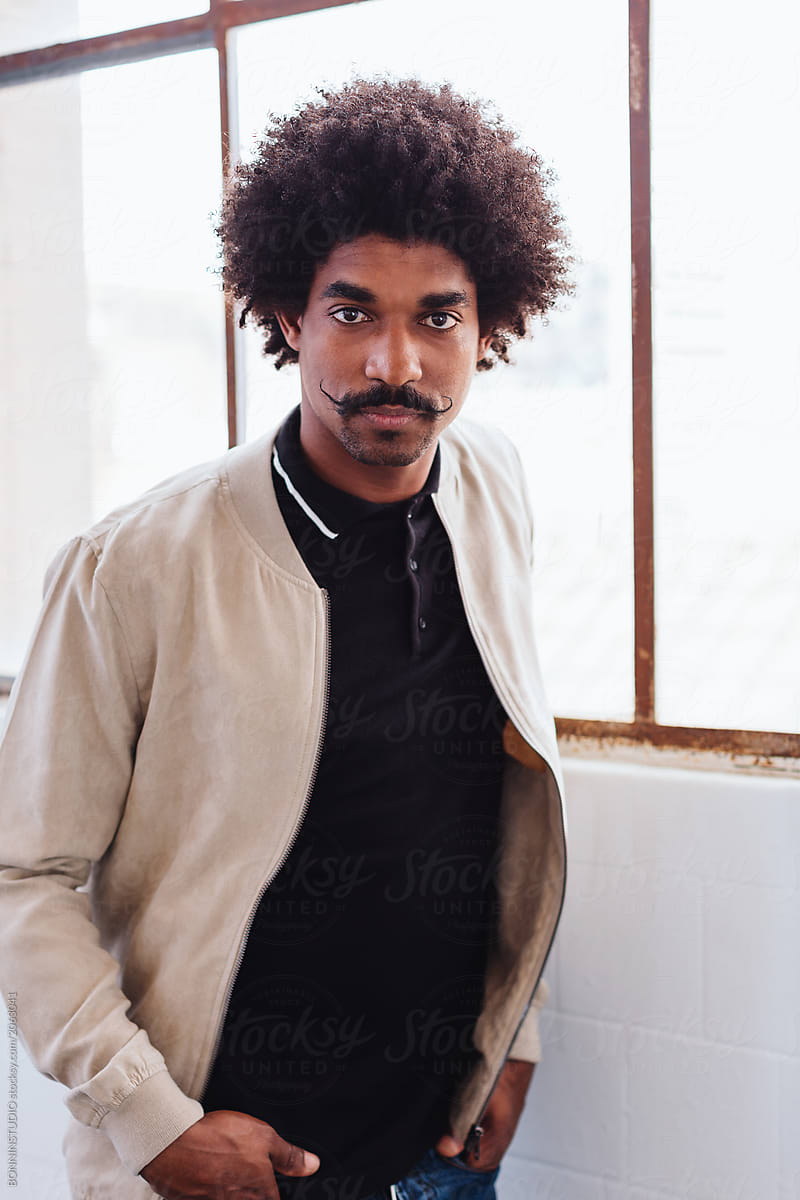 "Portrait Of A Young Afro Man." by Stocksy Contributor "BONNINSTUDIO ...