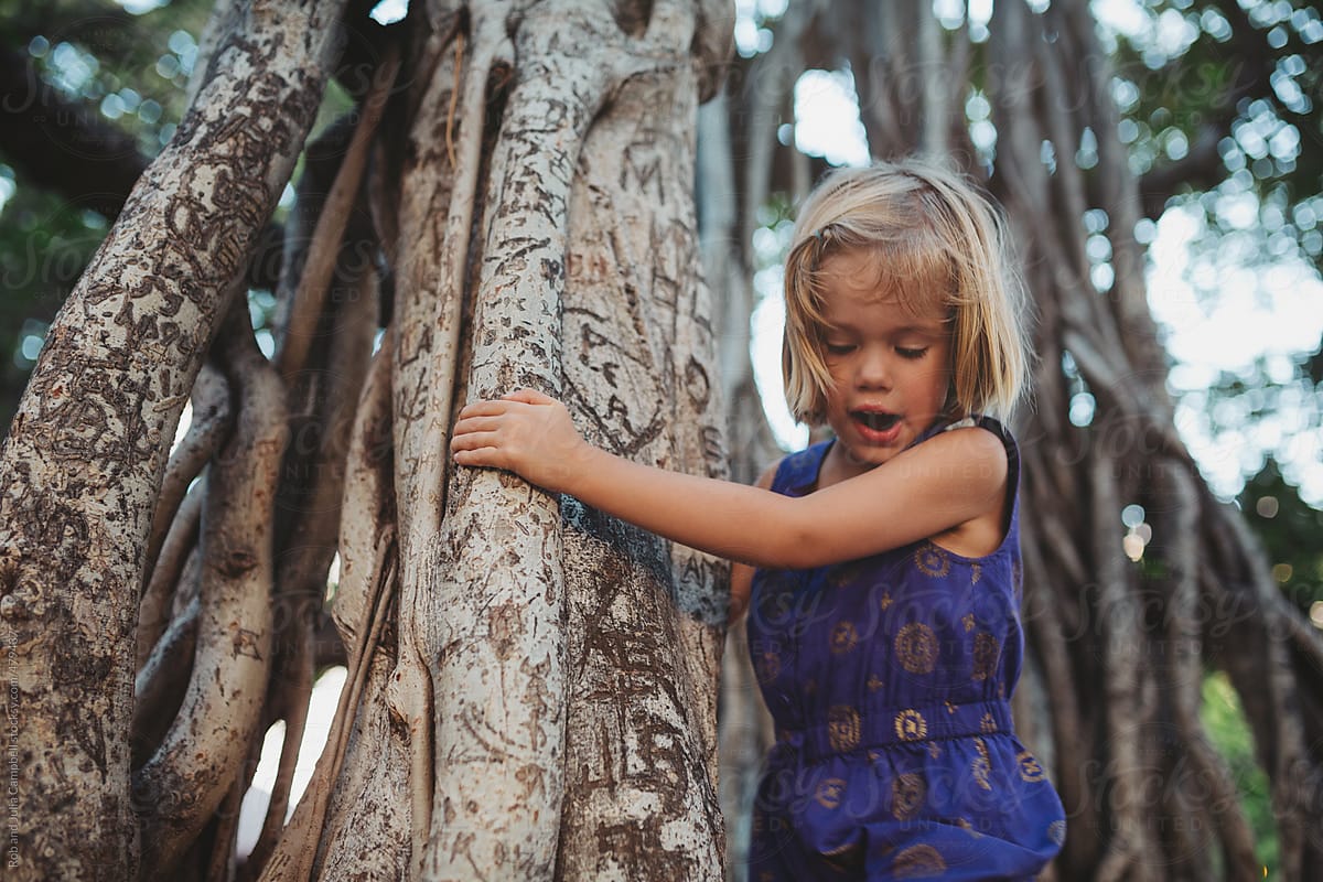 Young Girls Climbing Trees