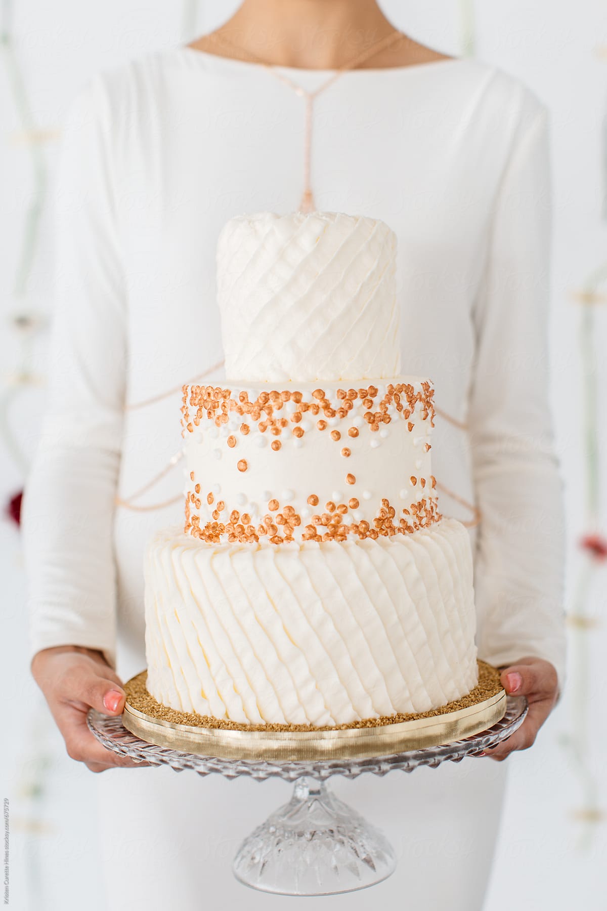"A Beautiful Bride Holding A Decorative Cake" by Stocksy Contributor ...