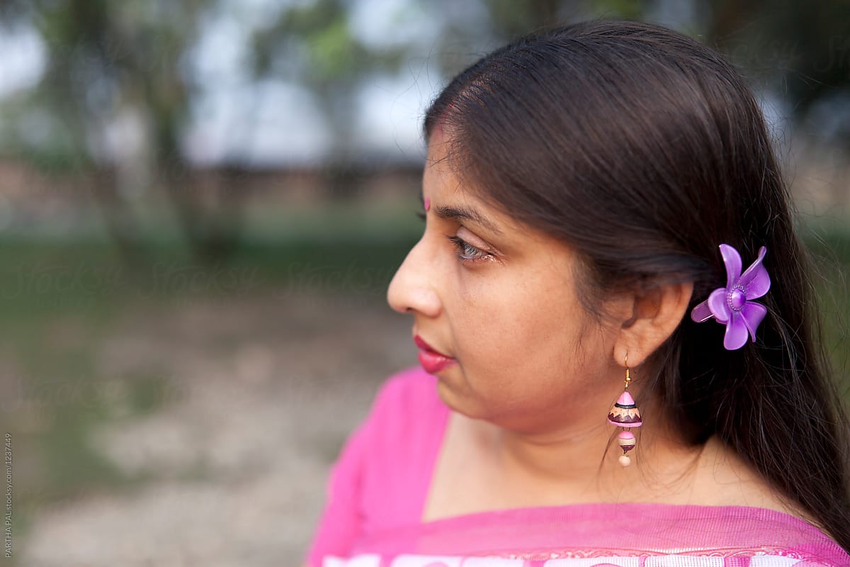 "Side View Of Indian Woman With Traditional Dress At Outdoor" by ...