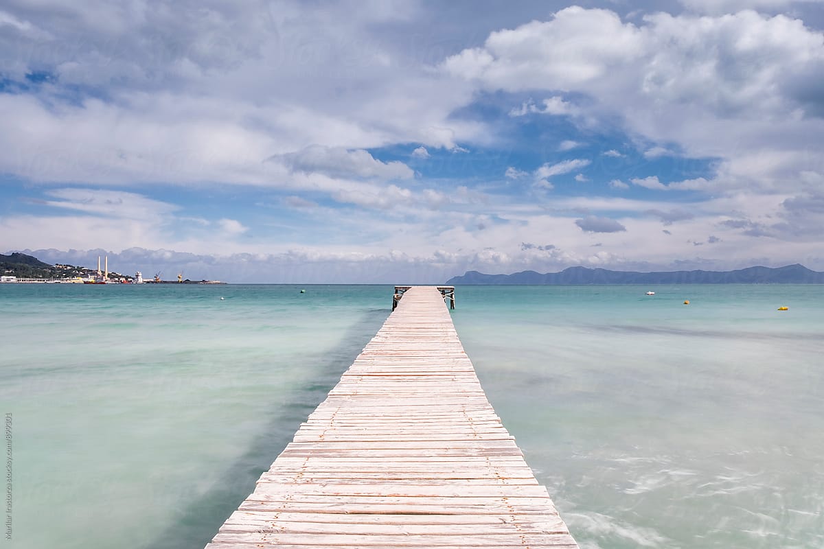 "Boardwalk Through Sea" by Stocksy Contributor "Marilar Irastorza ...