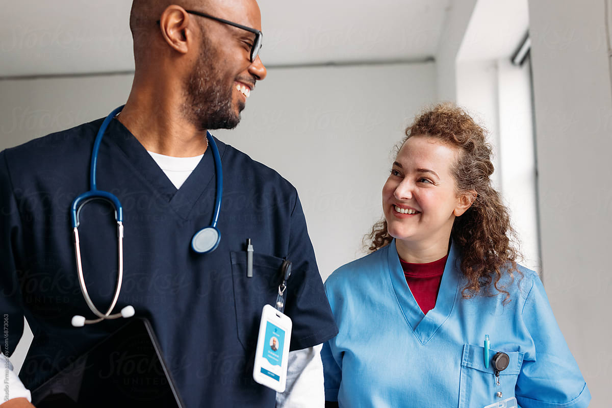 "Cheerful Hospital Staff" by Stocksy Contributor "Studio Firma" - Stocksy