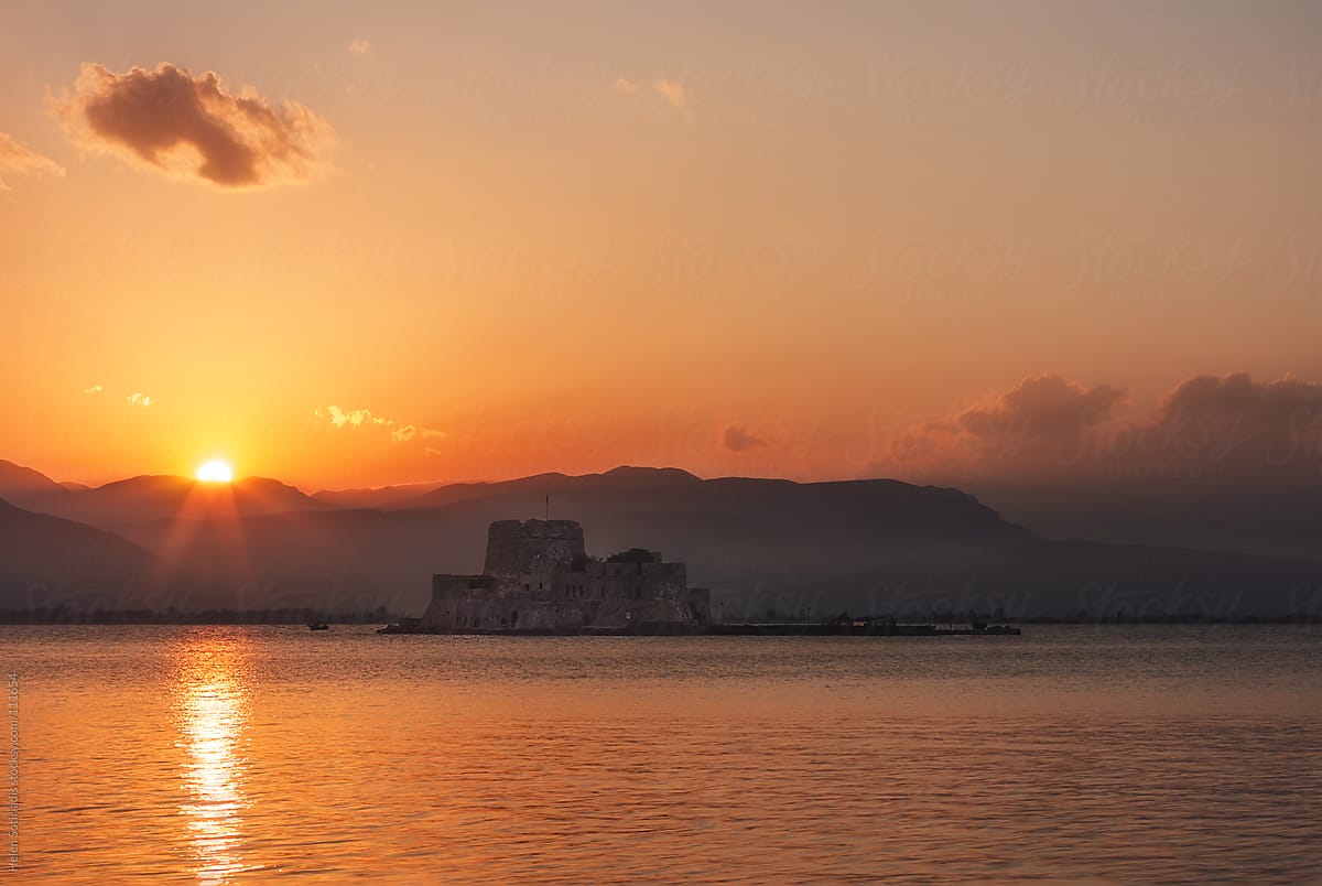 "Sunset At Bourtzi Castle, Nafplio, Greece" by Stocksy Contributor ...