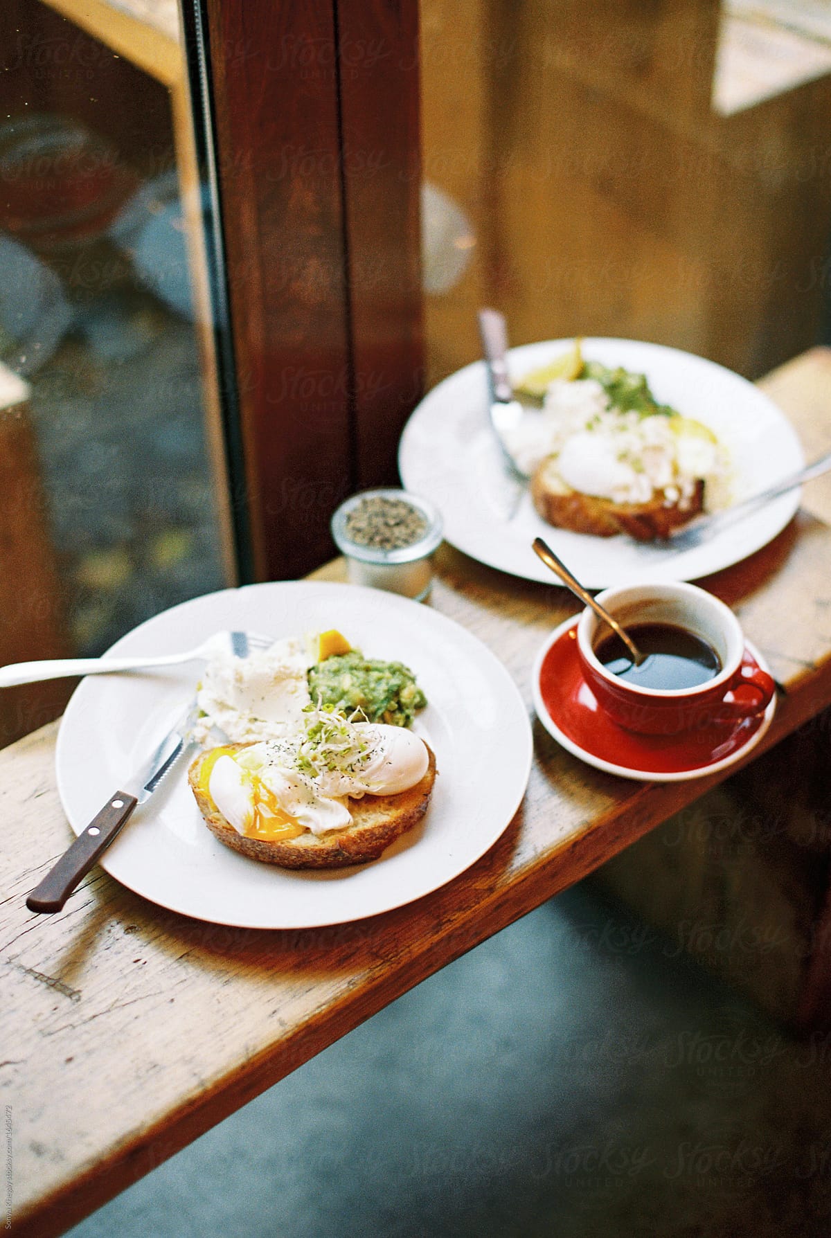 "Breakfast At A Cafe" by Stocksy Contributor "Sonya Khegay" - Stocksy