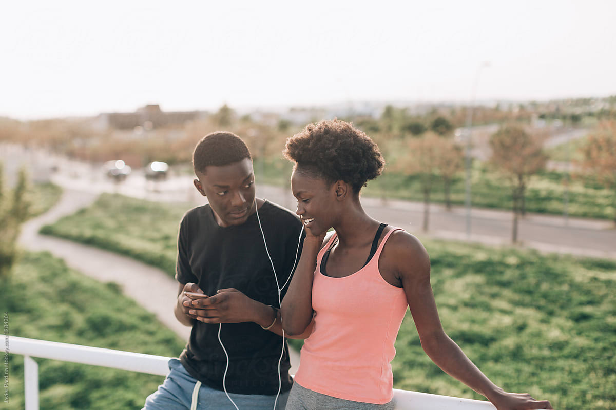 "Woman Learning Sport To Young Man" by Stocksy Contributor "Pardina ...
