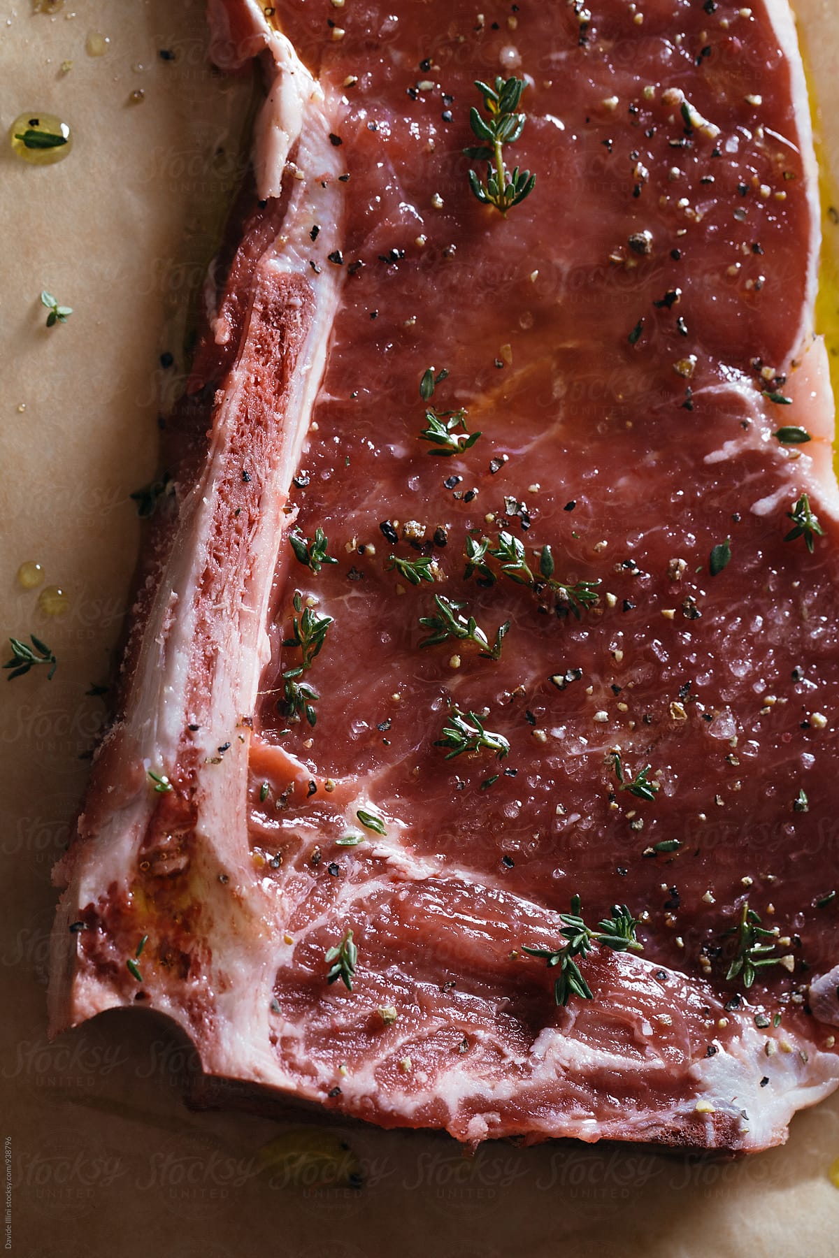 "Raw Beef Steak" by Stocksy Contributor "Davide Illini" - Stocksy
