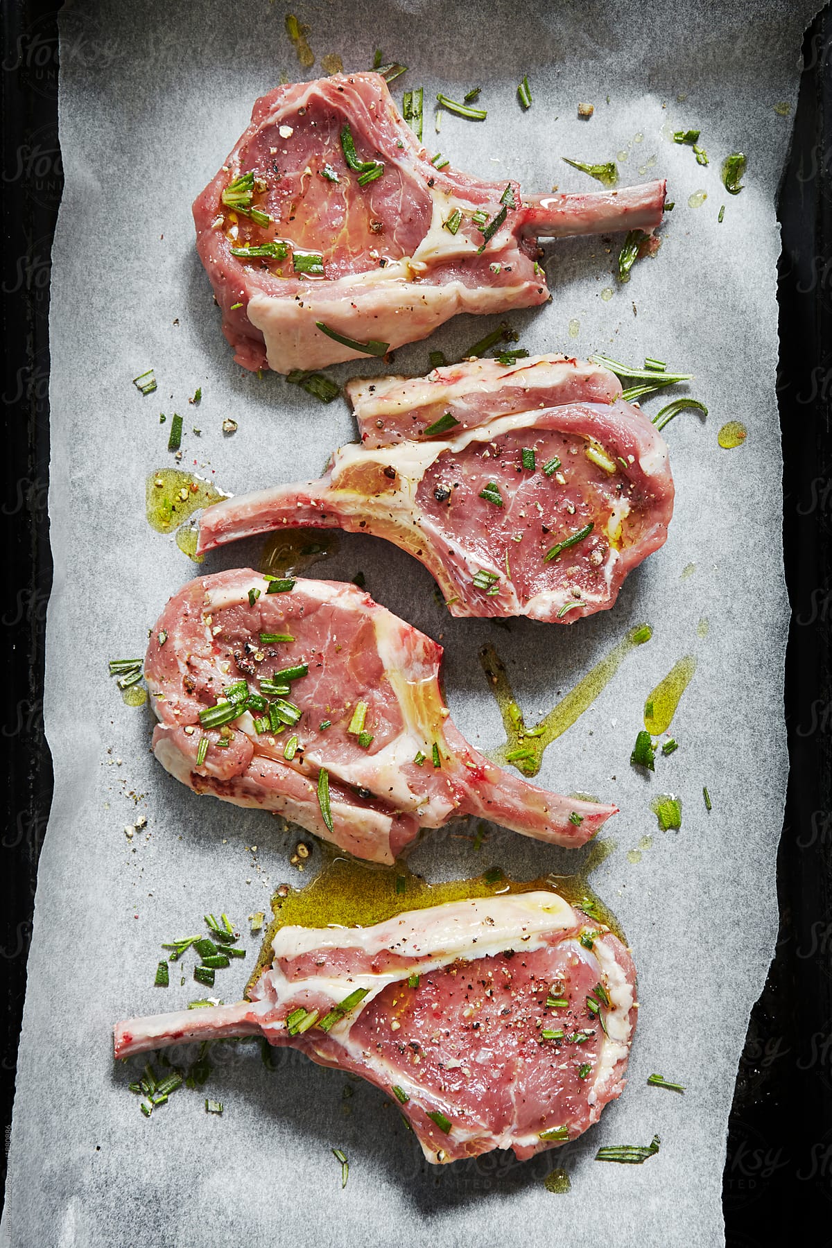 "Lamb Cutlets" by Stocksy Contributor "James Ross" - Stocksy