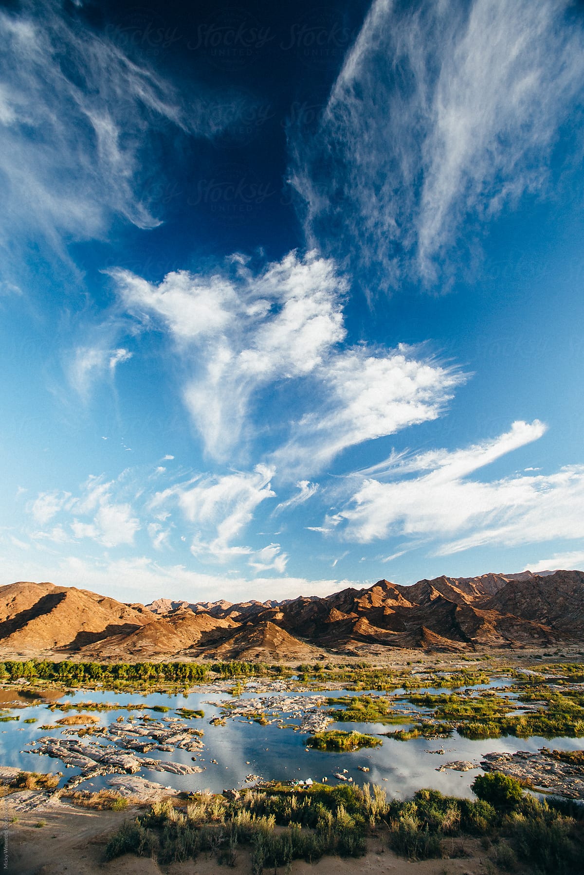 "Scenic Orange River And Mountains At Sunset" by Stocksy Contributor ...