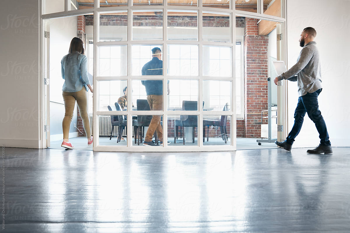 "People Arrive For A Business Meeting" by Stocksy Contributor "Walter ...
