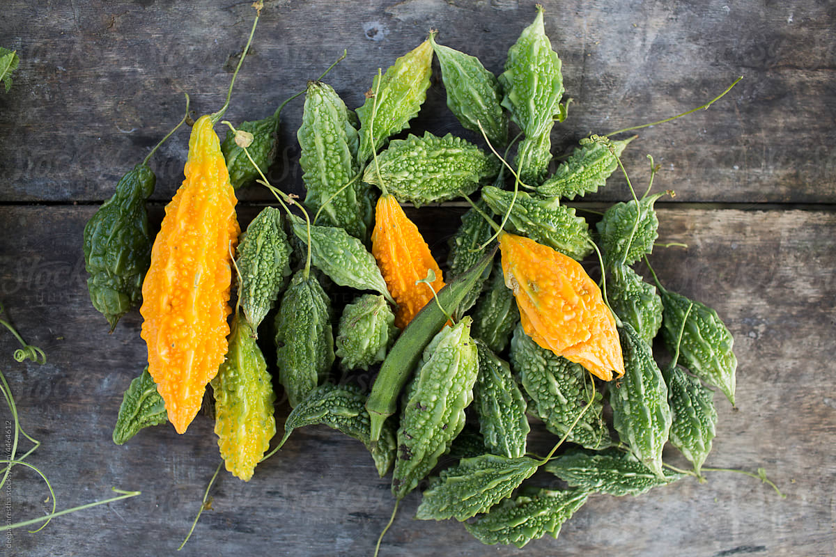 "Ripped And Raw Bitter Melon" by Stocksy Contributor "Deepa Shrestha ...