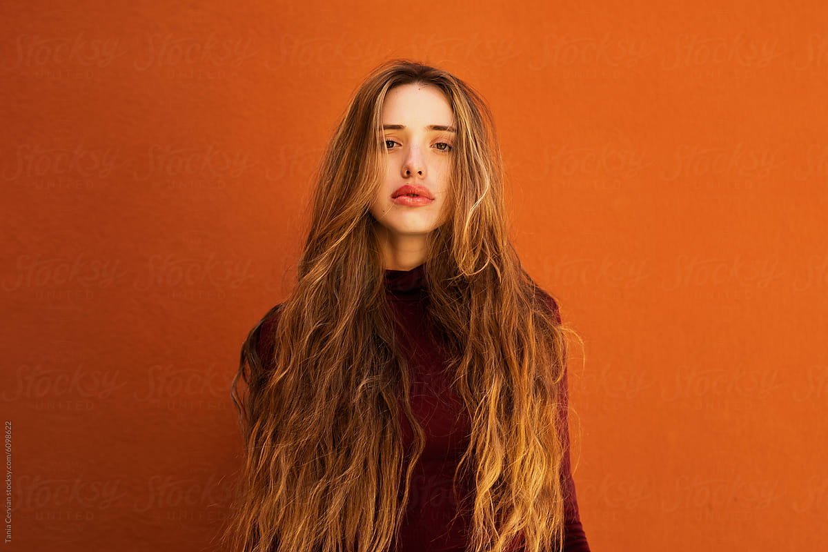 "Thoughtful Long Haired Model Looking At Camera" by Stocksy Contributor ...
