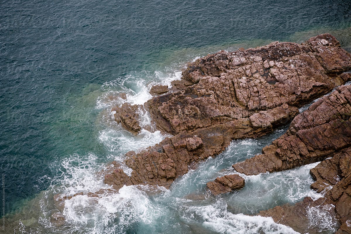 "Rocky Cliffs And Rough Sea Below" by Stocksy Contributor "Alexandr ...