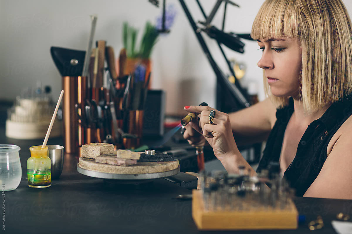 "Young Attractive Jewelry Designer Working On A Piece In Her Workshop ...