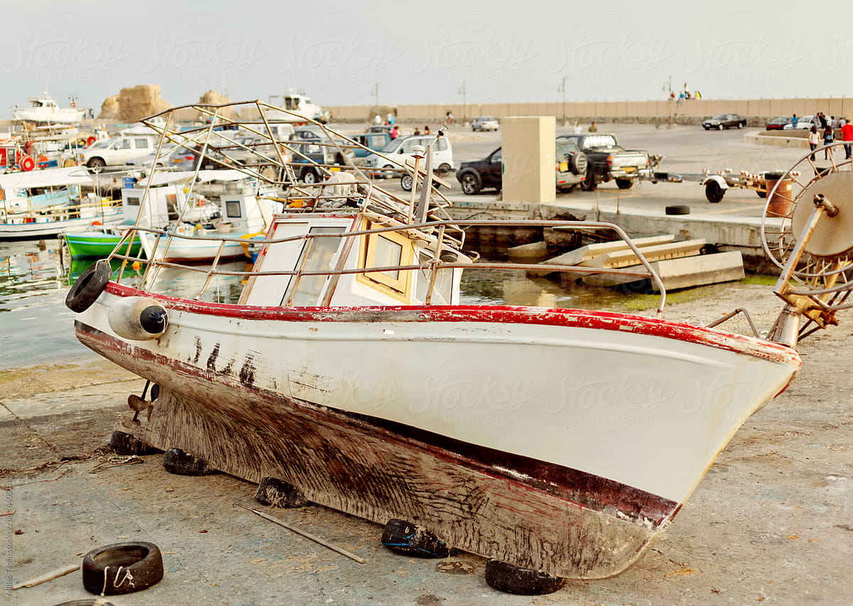 "Abandoned Boat" by Stocksy Contributor "Milles Studio" - Stocksy
