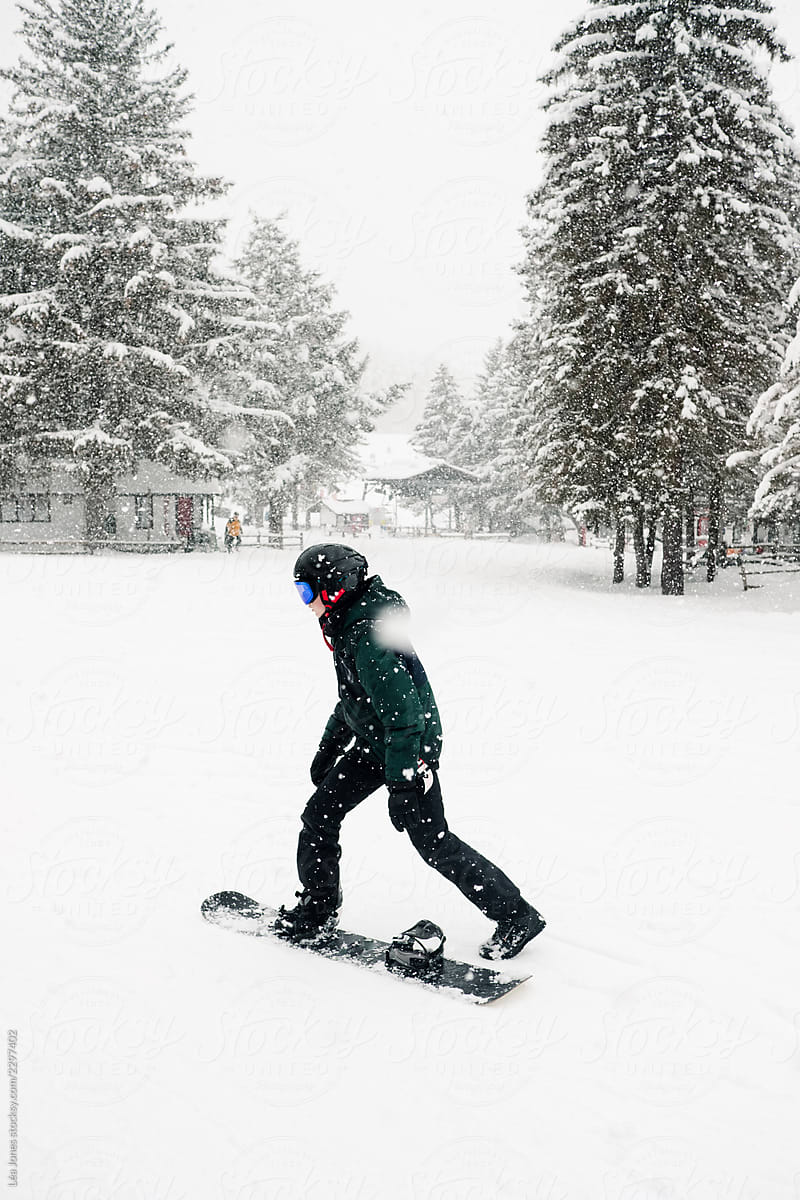 "Teen With Snowboard" by Stocksy Contributor "Lea Jones" - Stocksy