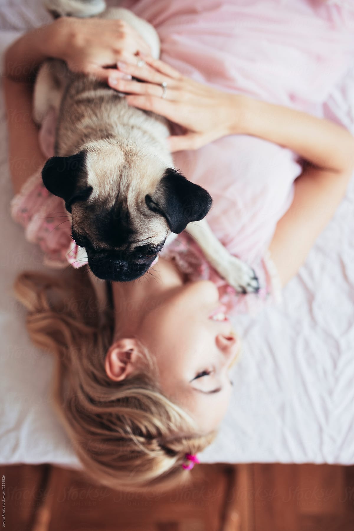 "Young Woman And Her Pets" by Stocksy Contributor "Jovana Rikalo" - Stocksy