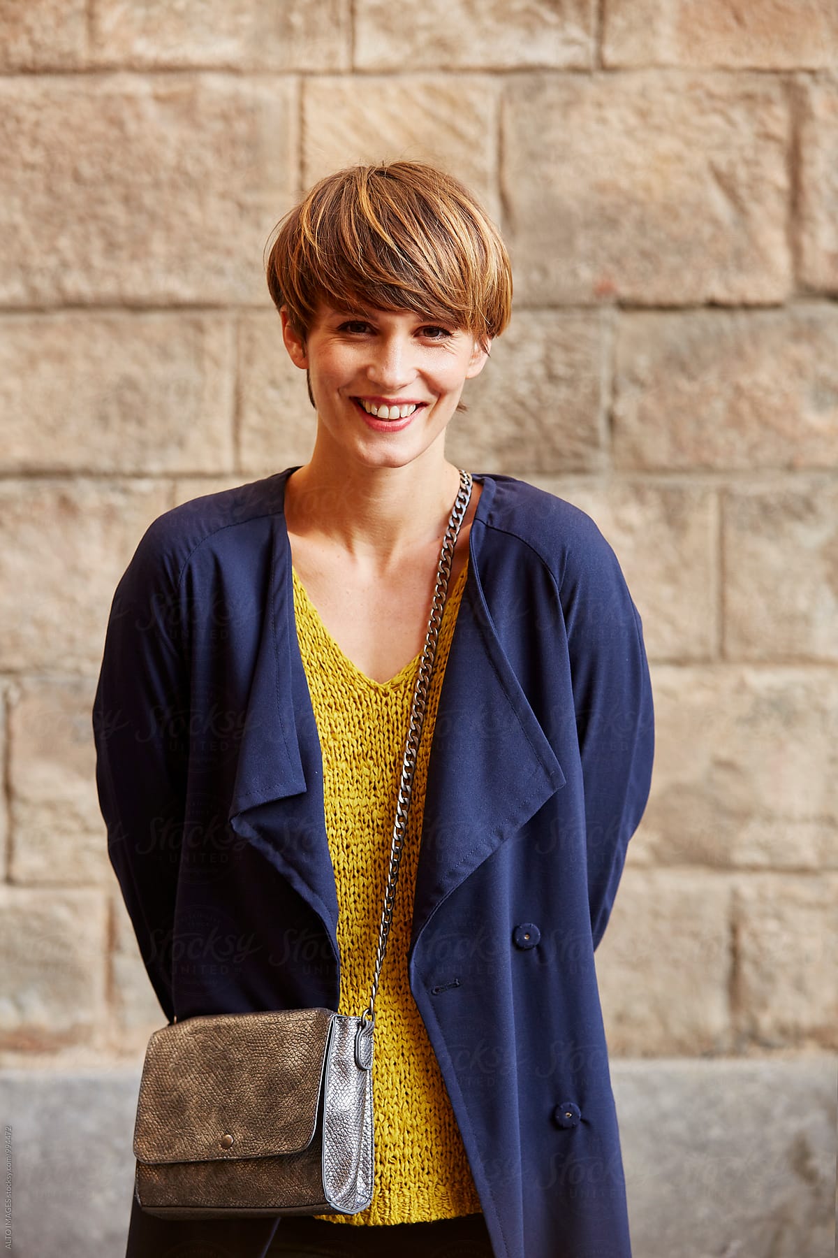 "Beautiful Young Woman Smiling Against Wall" by Stocksy Contributor ...