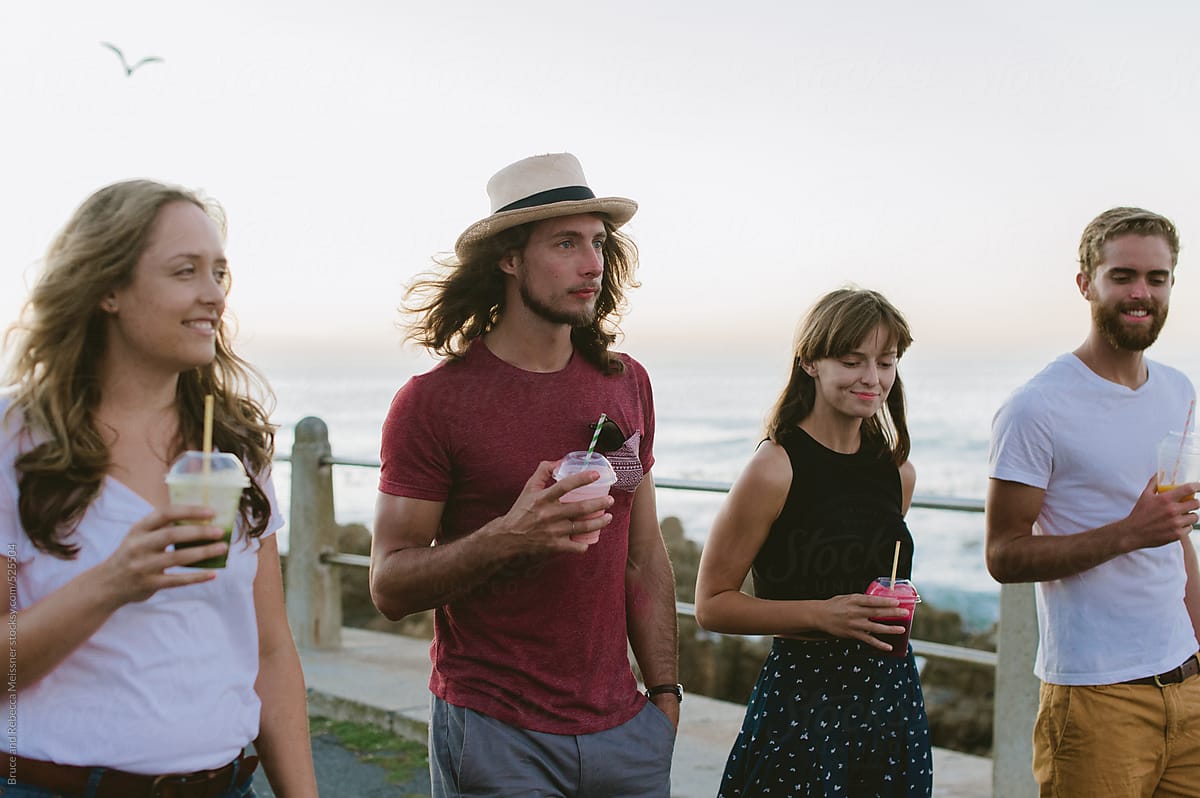 "Friends Enjoying Juice" by Stocksy Contributor "Bruce and Rebecca ...