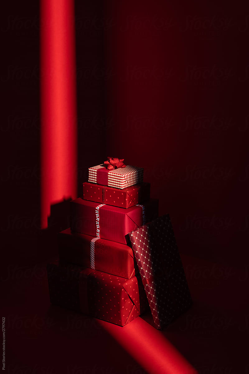 "Red Themed Christmas Presents" by Stocksy Contributor "Pixel Stories ...