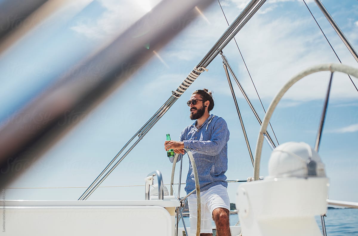 "Portrait Of A Man On Sailing Boat" by Stocksy Contributor "Lumina ...