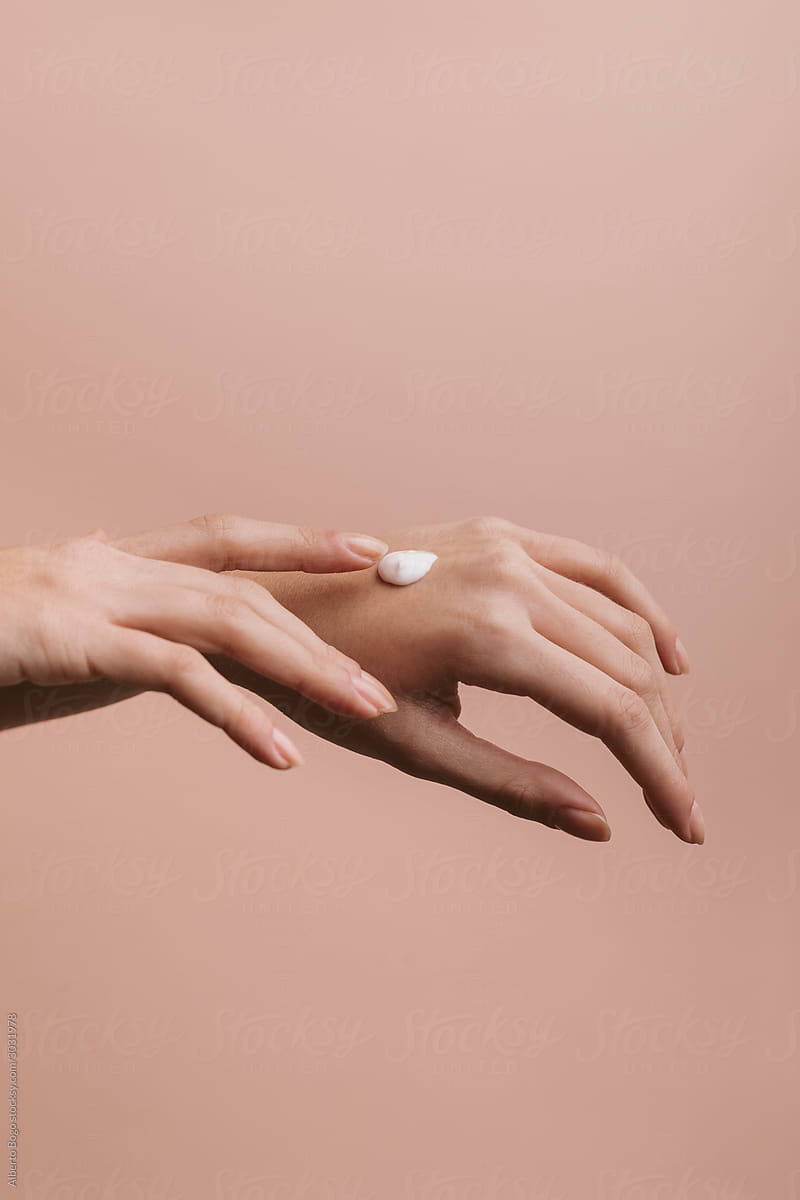 "Woman Applying Cosmetic Creme On Her Hand" by Stocksy Contributor ...