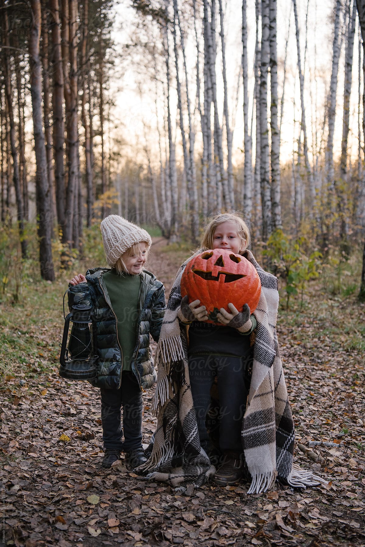 "Adorable Kids Playing With Pumpkin" by Stocksy Contributor "Alexandr ...