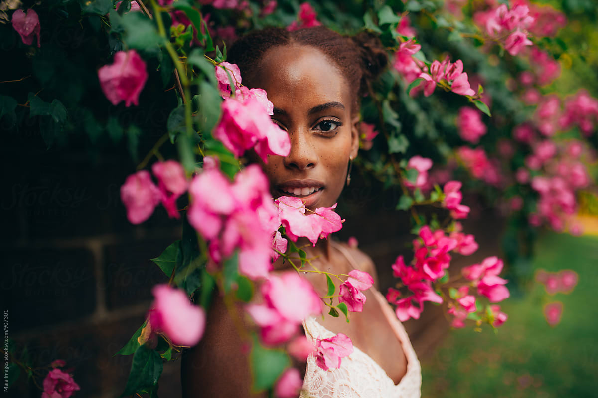 "Beautiful Woman In Garden" by Stocksy Contributor "Maia Images" - Stocksy