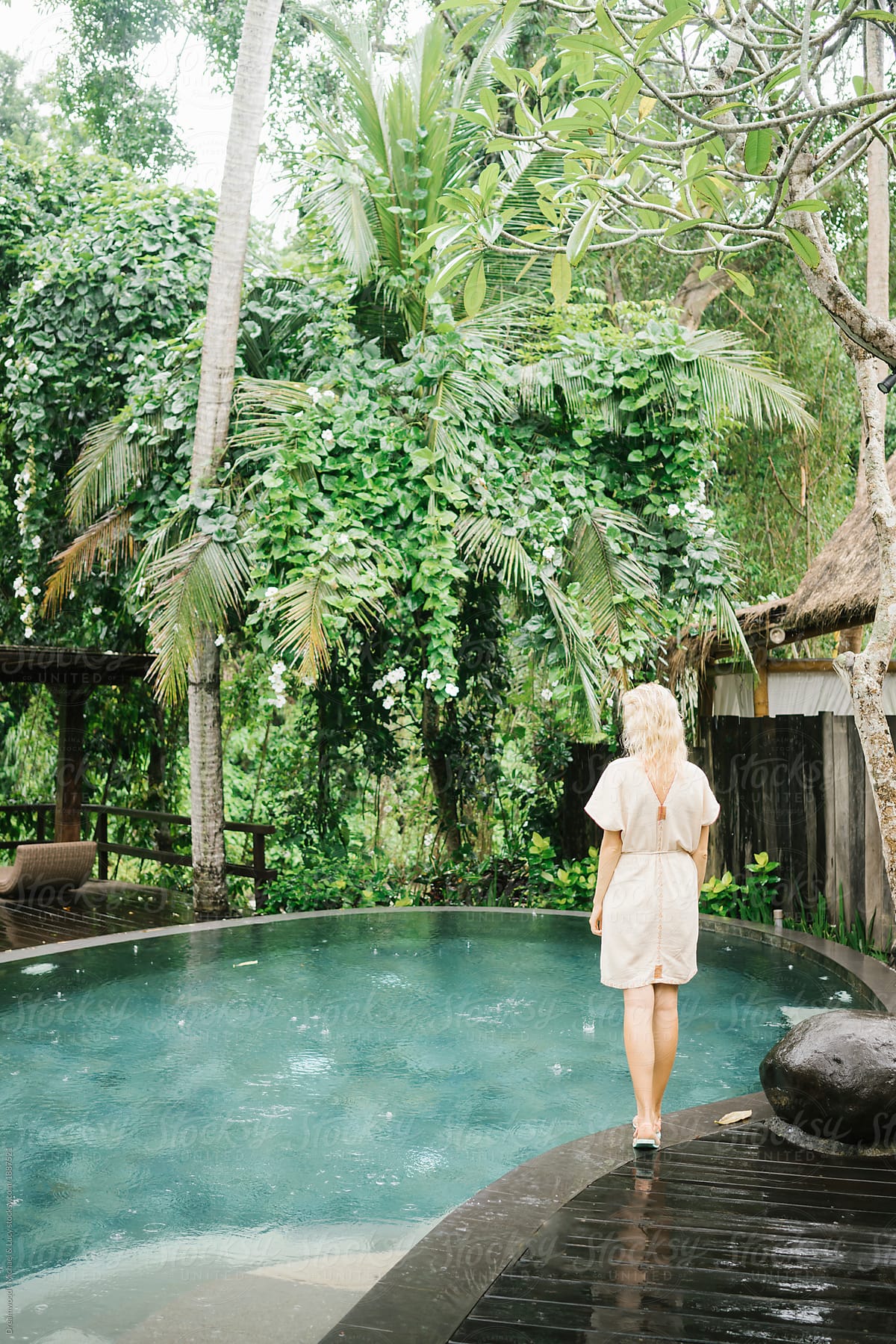 "Romantic Girl On Wet Poolside Of Hotel" by Stocksy Contributor ...