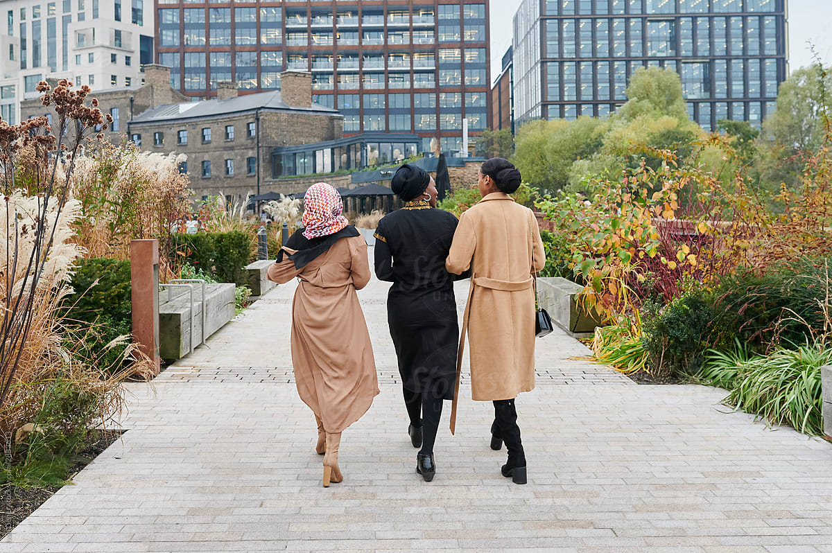 "Three Muslim Women Walking In A Park" by Stocksy Contributor "Ivan ...